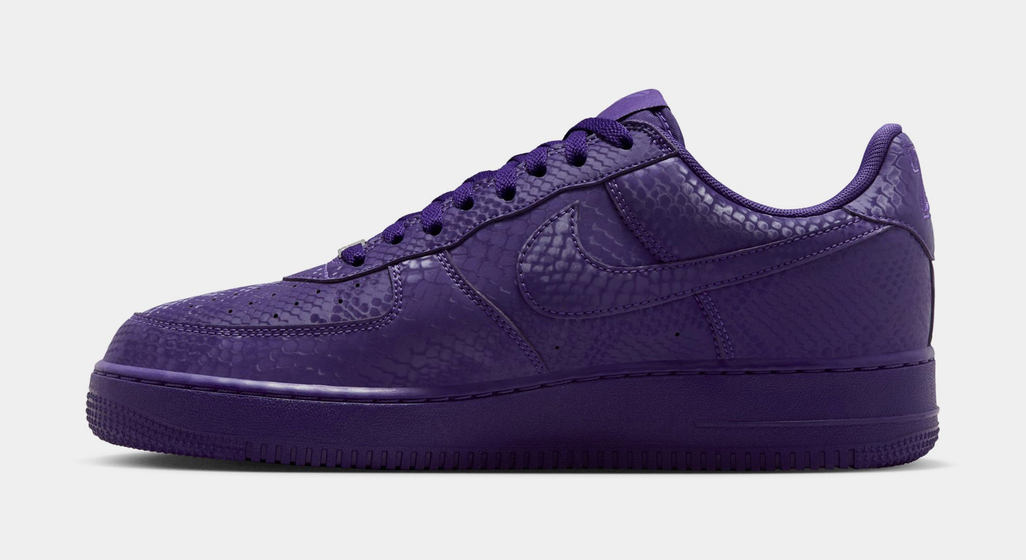 purple nike logo shoes